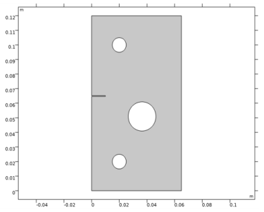 Brittle Fracture of a Holed Plate